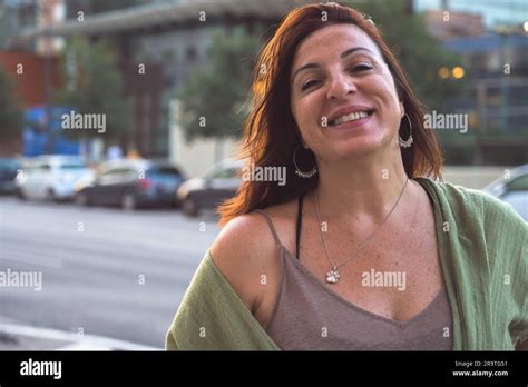 Fresh And Natural Portrait Of A Brunette Woman Captured In An Outdoor Environment Stock Photo