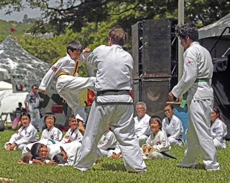 Korean Taekwondo Girl Jump Kicking Breaking Board Editorial Photography