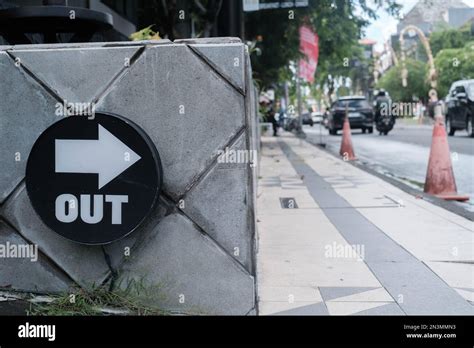 Exit Ahead Arrow Sign On A Side Street With Blurred Background Stock Photo Alamy