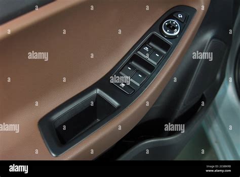 Side Mirror Switch Control And Window Button Car Interior Detail Stock