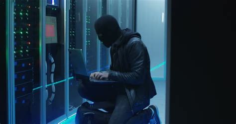 Anonymous Hacker Breaking Into Server System Stock Footage Videohive