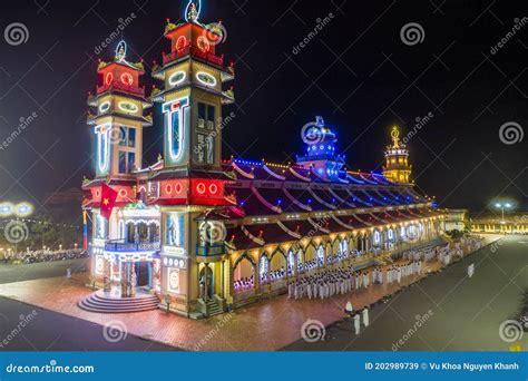 Aerial Night View Of Meditating Followers Of The Cao Dai Religion