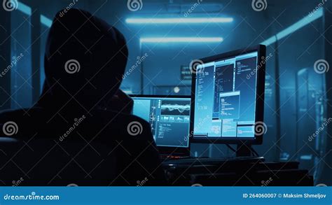 Computer Hacker In Hoodie Obscured Dark Face Concept Of Hacker Attack Virus Infected Software