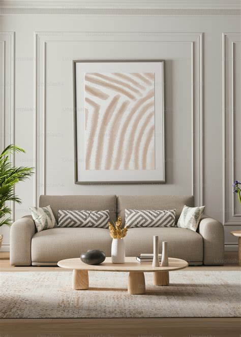 소파 커피 테이블 화분이 있는 거실 사진 Unsplash의 그림 이미지