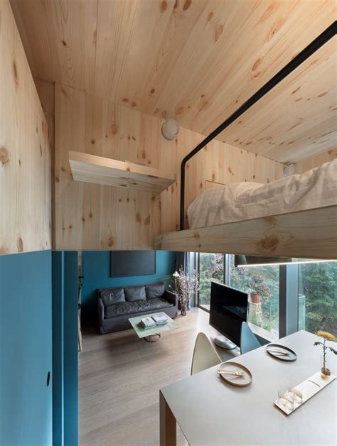 NCDA Designs Wood Screened Loft Bedroom For Tiny Hong Kong Treehouse