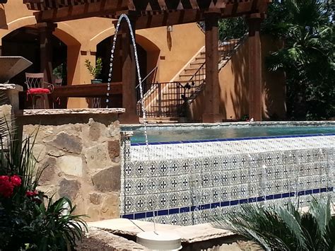Infinity Edge Pool With Spa Laminar Jets Aqua Blue Pebble Sheen