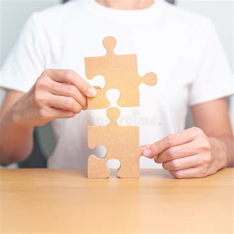 Hand Connecting Couple Puzzle Piece Business Solving Mission Challenge Success Goals
