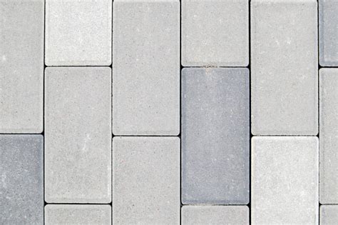 바닥이나 보도를 위한 콘크리트 또는 포장 된 회색 포장 석판이나 돌 뒤뜰 또는 도로 포장에 콘크리트 포장 슬래브 모래 기초안뜰의 정원 벽돌 길 거리에 대한 스톡 사진 및