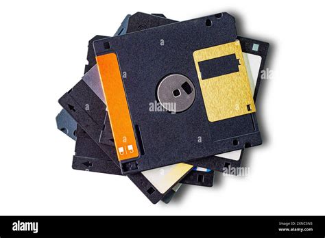 Top View Pile Of Old Storage Technology Diskette For Old Computer Isolated On White Background
