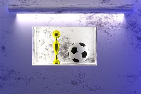 축구 공과 황금 컵 푸른 빛으로 조명 된 콘크리트 벽에서 발견됩니다 축구 선수권 대회 승리 개념 3d 렌더링 0명에 대한 스톡 사진 및 기타 이미지 Istock