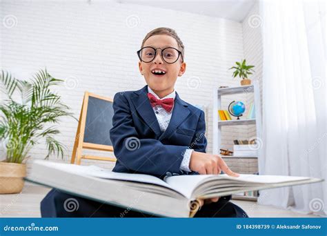 School Nerd With Glasses Points At A Book And Laughs Back To School Stock Image Image Of