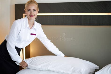 Nice Maid Prepares A Bed For Guests Stock Image Image Of Indoors