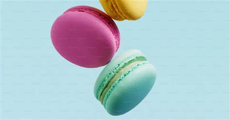 마카롱 비스킷 화려한 마카롱이 날고 있습니다 파란색 배경에 떨어지는 움직임의 프랑스 디저트 고해상도 사진 Unsplash의 공중 부양 이미지