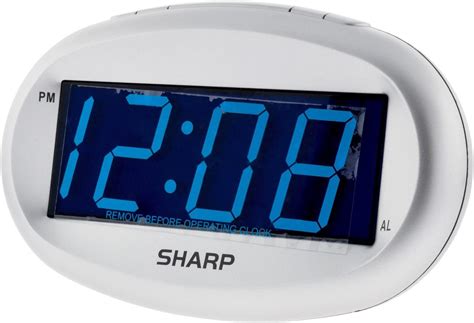 Amazon Com Sharp Blue LED Alarm Clock With Dimmer Silver Home Kitchen