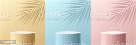 3d 현실적인 실린더 스탠드 연단은 야자수 잎 그림자가 있는 노란색 파란색 분홍색 흰색 배경에 있습니다 추상 벽 최소 장면 모형 제품 디스플레이 무대 진열장 3d 파스텔