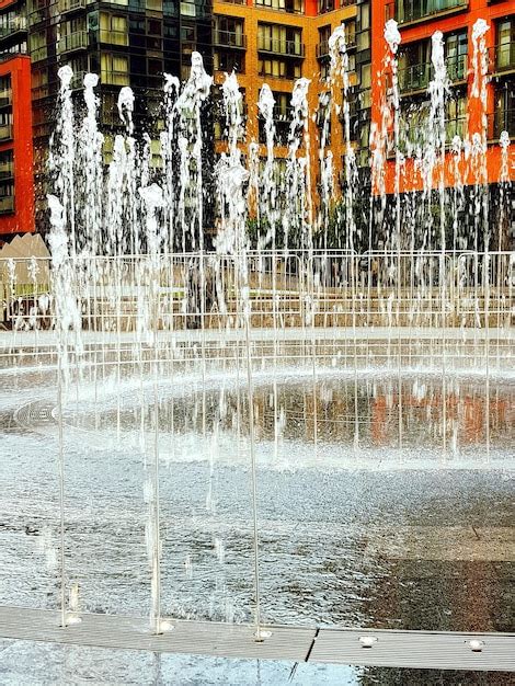 Premium Photo Fountain On Street In City