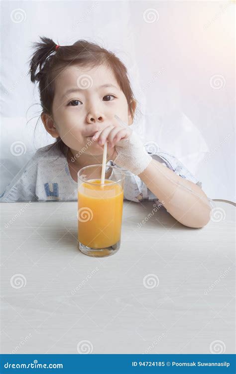 Asian Girl While Sucking Orange Juice To Nourish The Body Stock Image Image Of Healthcare