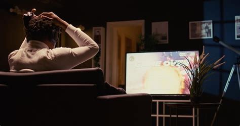 Free Photo Man In Living Room Feeling Angry And Shouting After Losing Level In Science Fiction