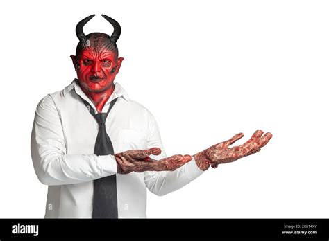 Devilman Is Standing With An Open Palm And Showing Something Isolated