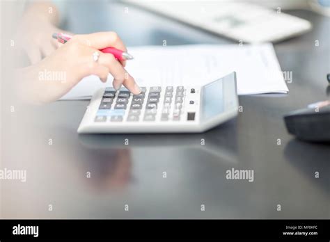 Businesswoman Calculator Pen Working Office Hi Res Stock Photography And Images Alamy