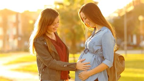 Why Do Pregnant Women Always Touch Their Bellies In Pictures