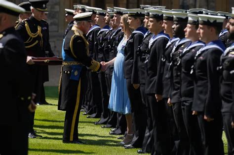 The King Honours Royal Navy Personnel Who Took Part In Queen Elizabeth