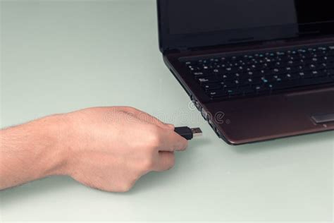 USB Black Flash Memory In Hand By Connecting It To The Laptop Stock Image Image Of Flash