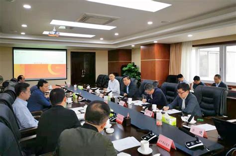 高国进与成都市金牛区委副书记区长周德强进行工作会谈
