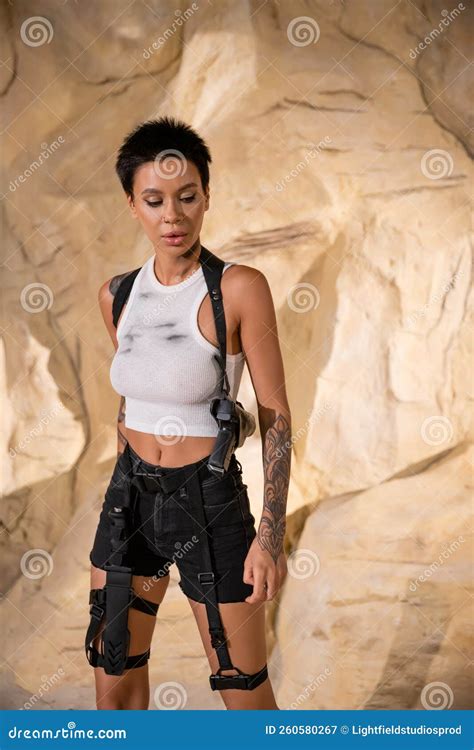 Armed And Tattooed Archaeologist In Stock Image Image Of Adventure