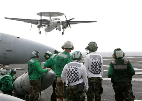 Flight Deck Crew From Strike Fighter Squadron 105 Vfa 105 Watch As An