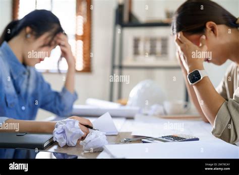 Engineering Construction Concept Two Engineers Stressful While Sketching Blueprint Of New