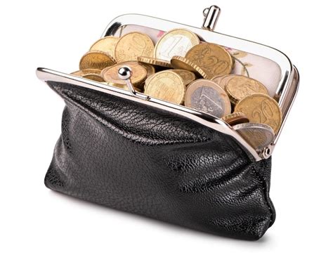 Black Wallet With Coins Premium Photo