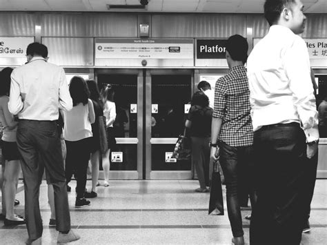 Premium Photo People Waiting In Queue At Railway Station