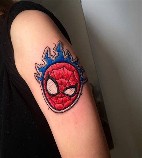 Embroidery Style Spider Man Tattoo Located On The Upper