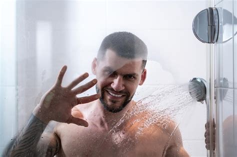 Premium Photo Sexy Muscular Man Taking Shower Washing His Body Back And Shoulders Handsome Guy