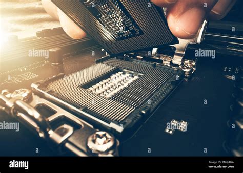 Computer Technician Installing New Powerful Processor While Building New Workstation Close Up