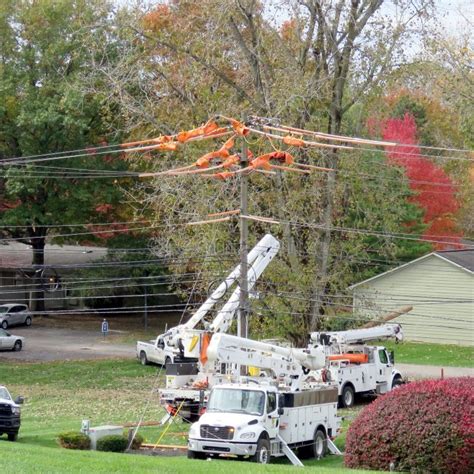 Repairs About To Resume On A Utility Pole S Multiple Power Lines Stock