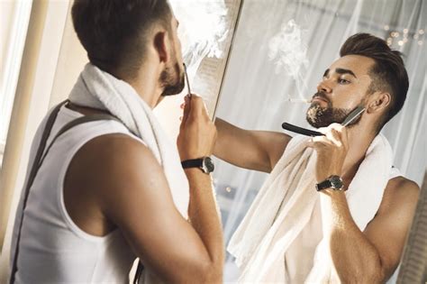 Premium Photo Side View Of Woman Looking At Camera