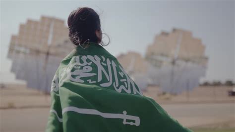 A Saudi Arabian Gulf Girl Carrying The Flag Of The Kingdom Of Saudi Arabia Car Participation In