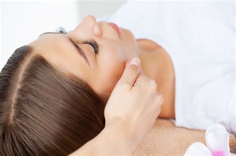 Beautiful Girl Has A Facial Massage In A Beauty Clinic Stock Image Image Of Girl Massage