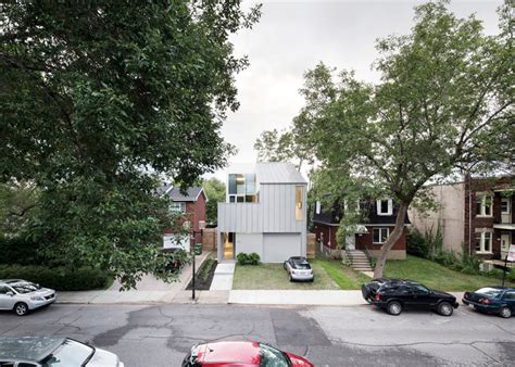 Holy Cross House By TBA Planned Around A Courtyard