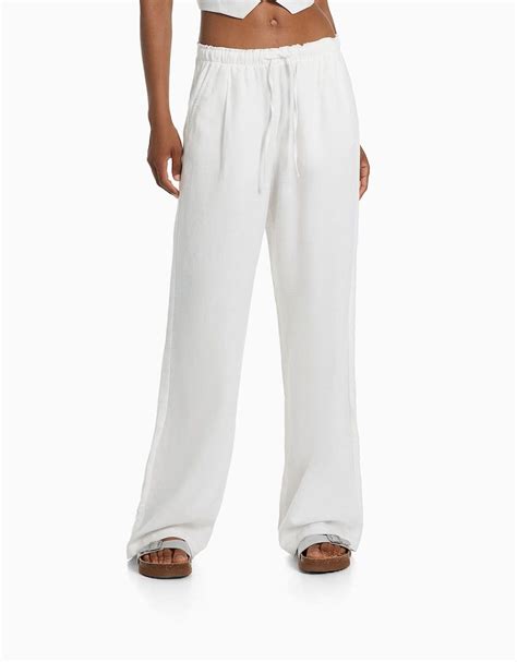 9 Looks Sencillos Con Pantalón De Lino Blanco Para Vestir Todo El Verano