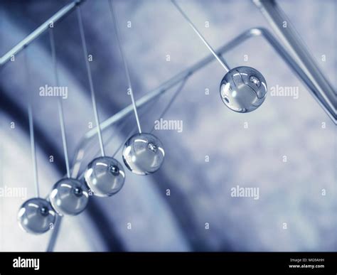 Newton S Cradle Momentum Hi Res Stock Photography And Images Alamy