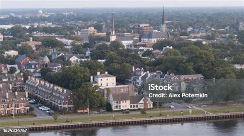 Riverside Journey Against Urban Backdrop Of Portsmouth Downtown Va