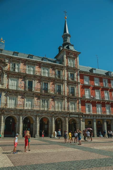 People On The Plaza Mayor With Old Large Building In Madrid Editorial