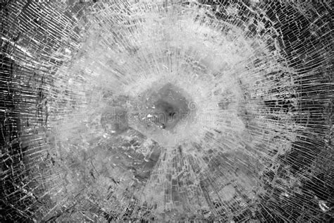 Bulletproof Glass After Test Bulletproof Glass With Cracks And A Crater From A Bullet Hit Stock