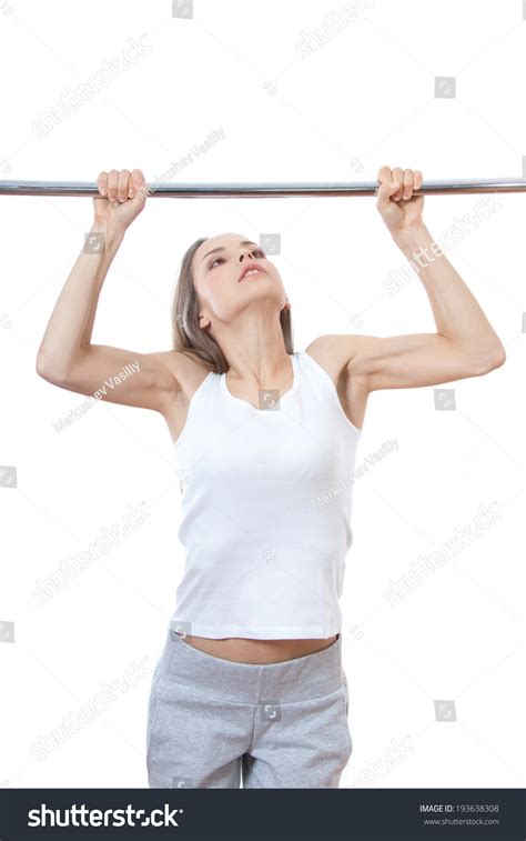 Woman Exercising On Pullup Bar Isolated Stock Photo 193638308 Shutterstock