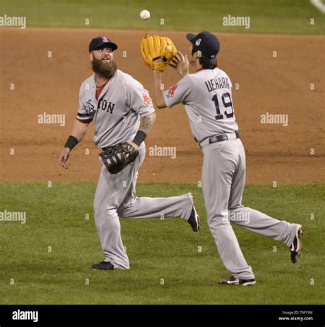 Boston Red Sox Relief Pitcher Koji Uehara R And First Baseman Mike