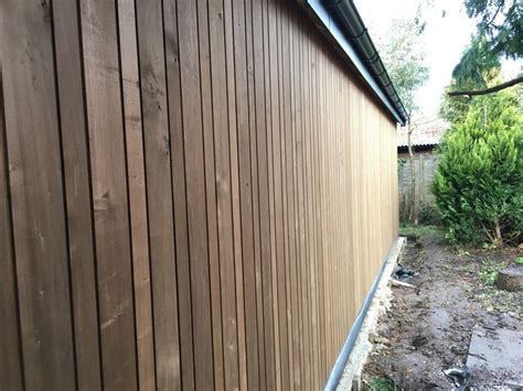 Vertical Timber Cladding On Garage Using Thermally Modified Poplar Timber Cedar Cladding