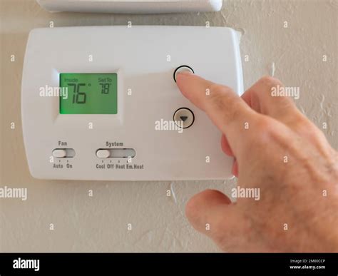 Setting Digital Thermostat To Cool And Programming Air Conditioning To Energy Saving Temperature